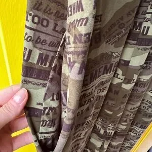 Pants & Jumpsuits | Green Camo Jumpsuit With Graphics | Poshmark